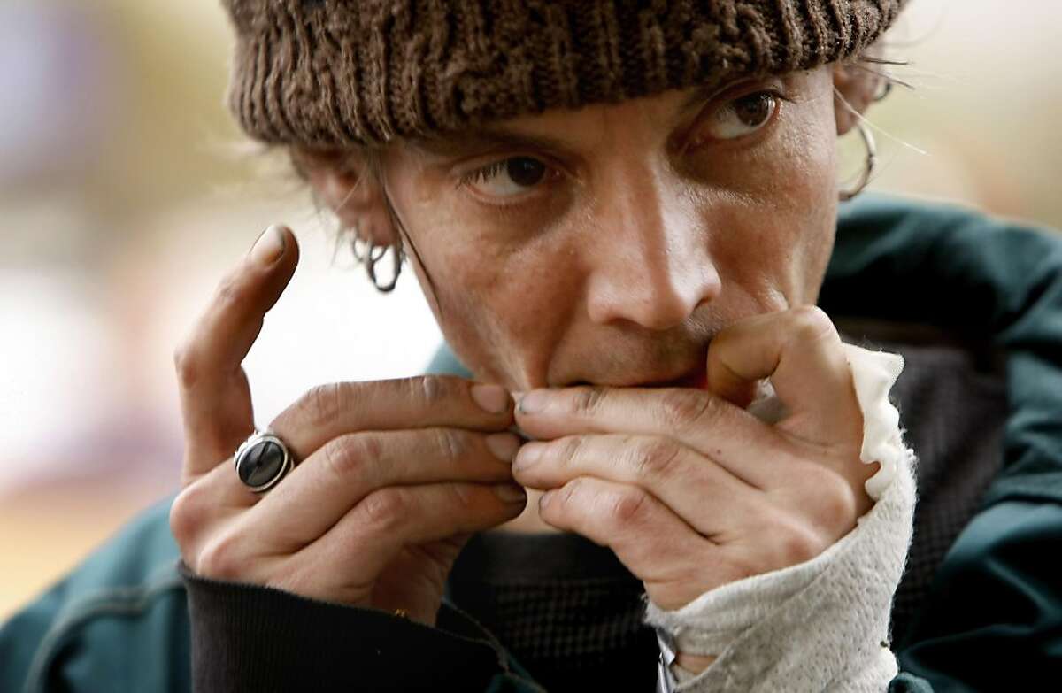 Activists scatter before police raid vacant hotels