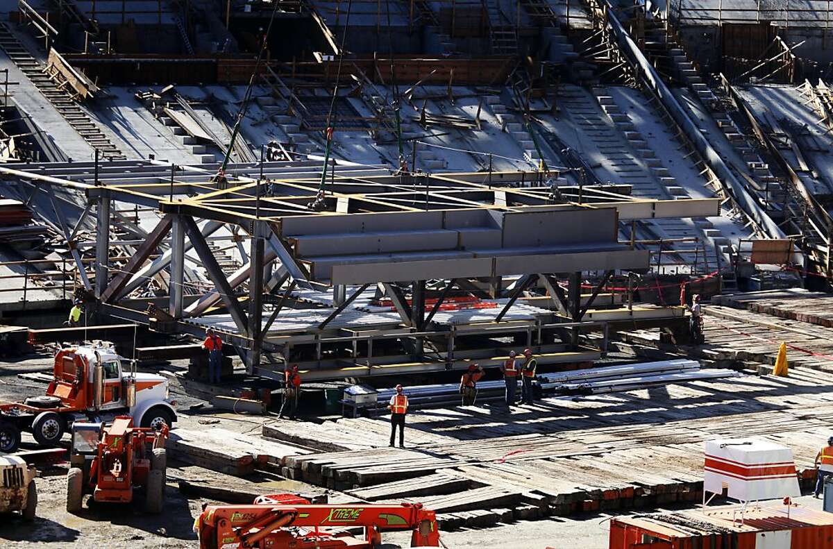 Press box lifted into place at Memorial Stadium