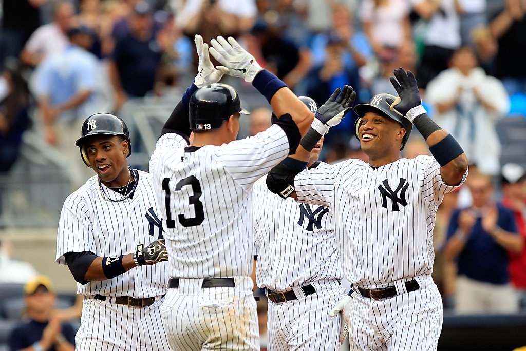 Yankees hit 3 grand slams to bury A's 22-9