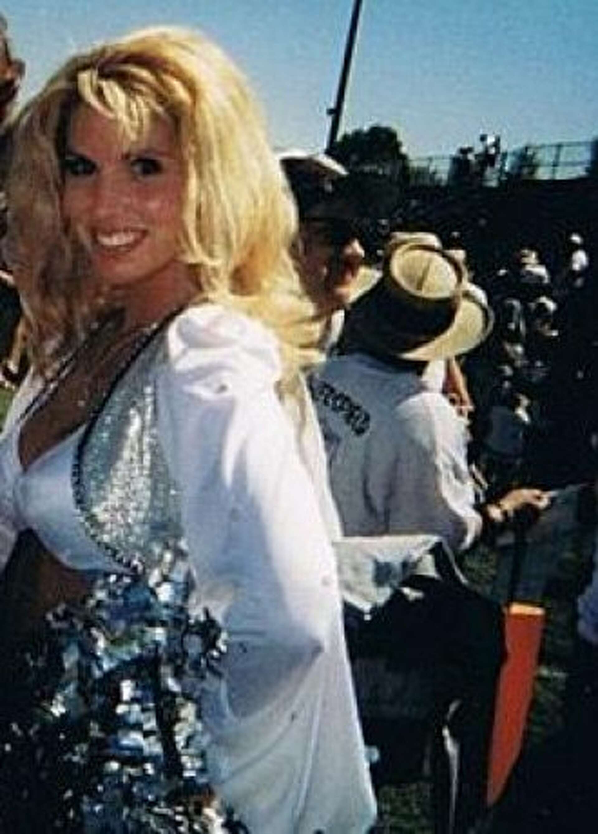 Ex-Raiderette, now officer, files harassment suit