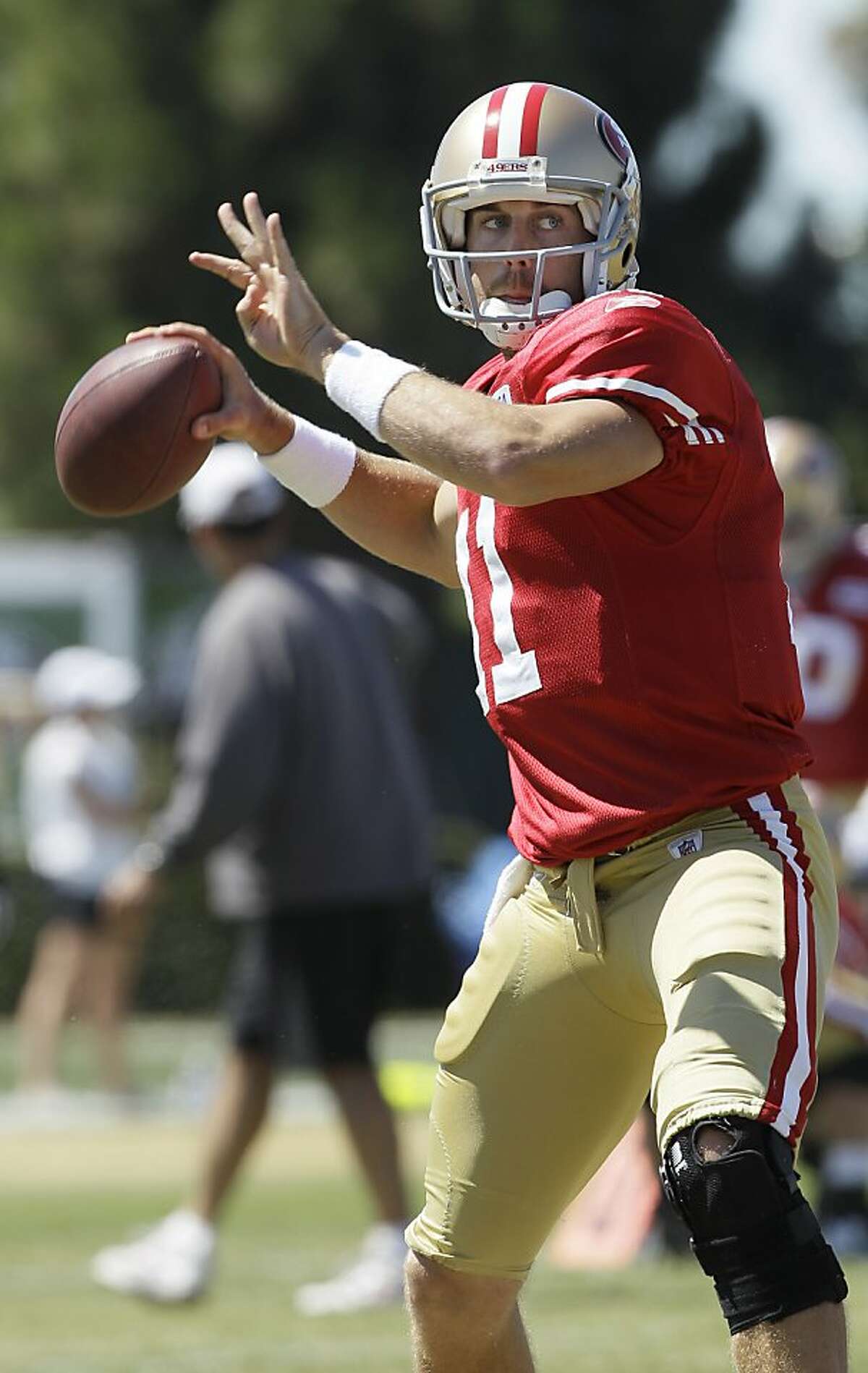 Harbaugh says Alex Smith looks good in practice