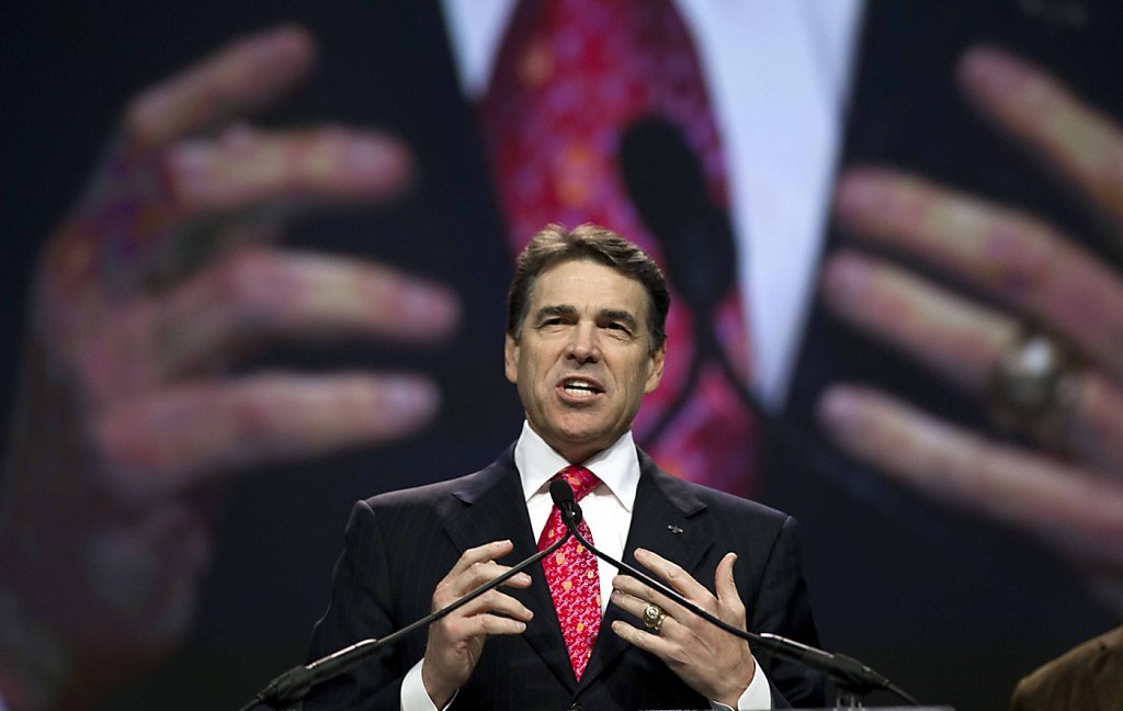 Texas Gov. Rick Perry presides over prayer rally