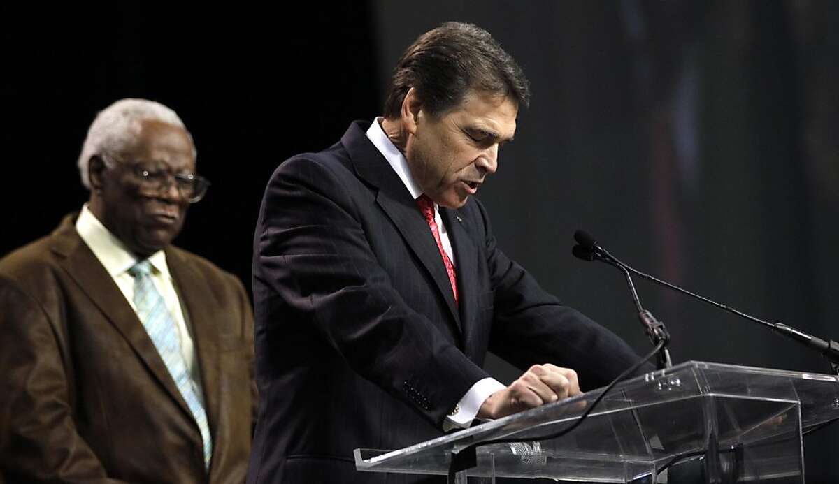 Texas Gov. Rick Perry presides over prayer rally
