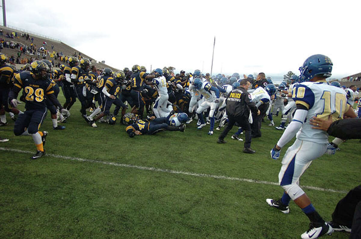 Ozen football team, coach, reprimanded and given 2-year probation