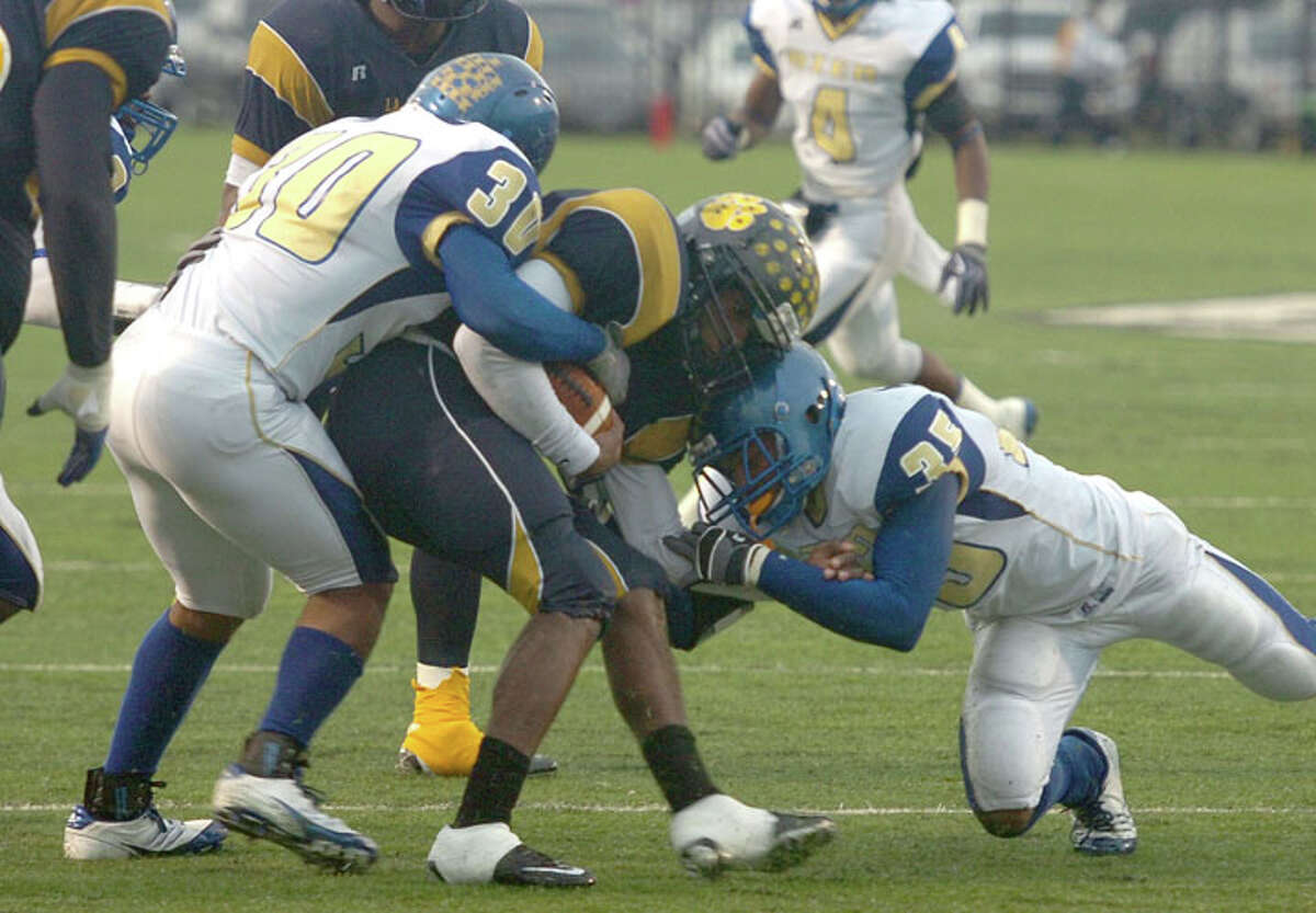 Ozen football team, coach, reprimanded and given 2-year probation
