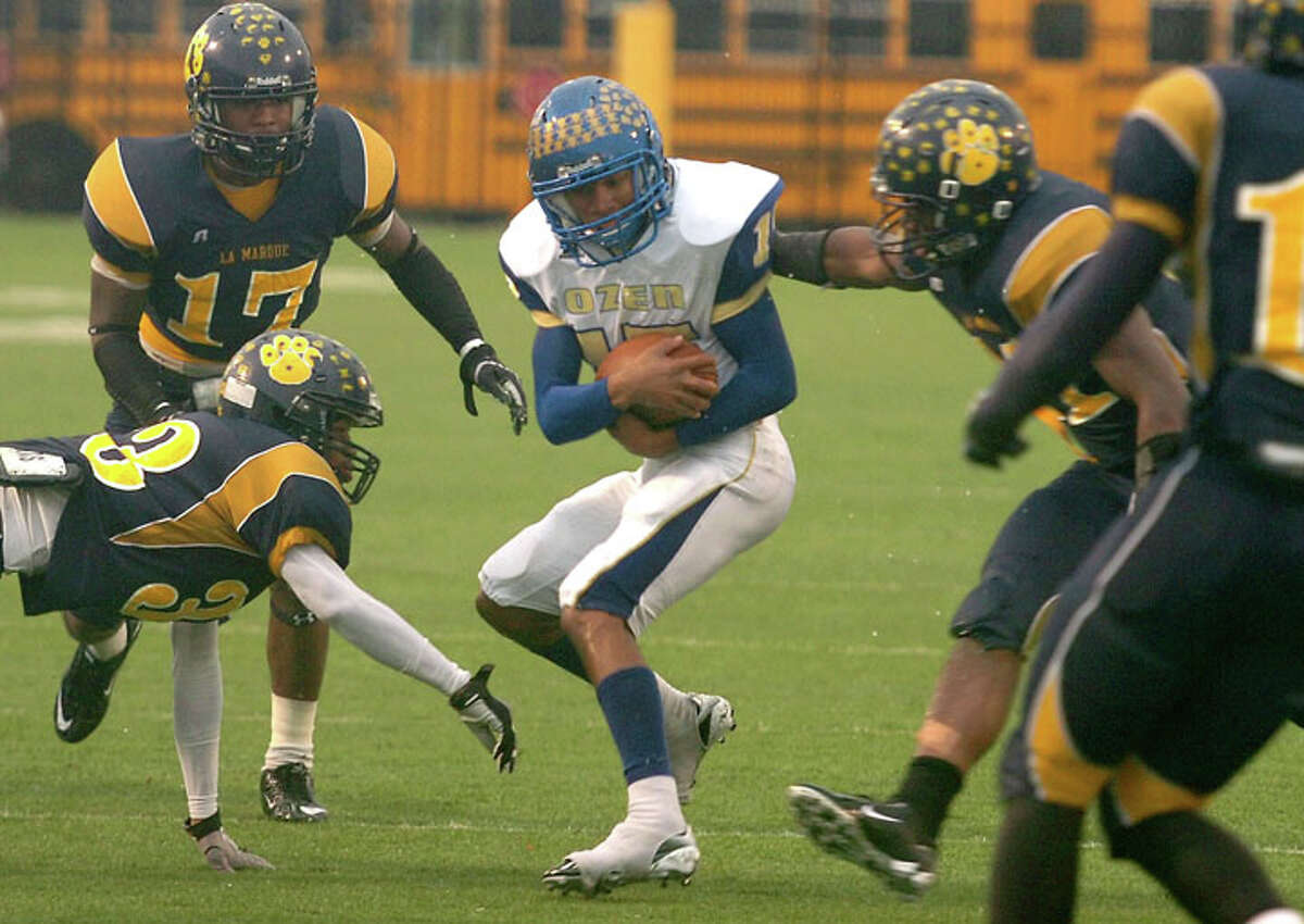 Ozen football team, coach, reprimanded and given 2-year probation