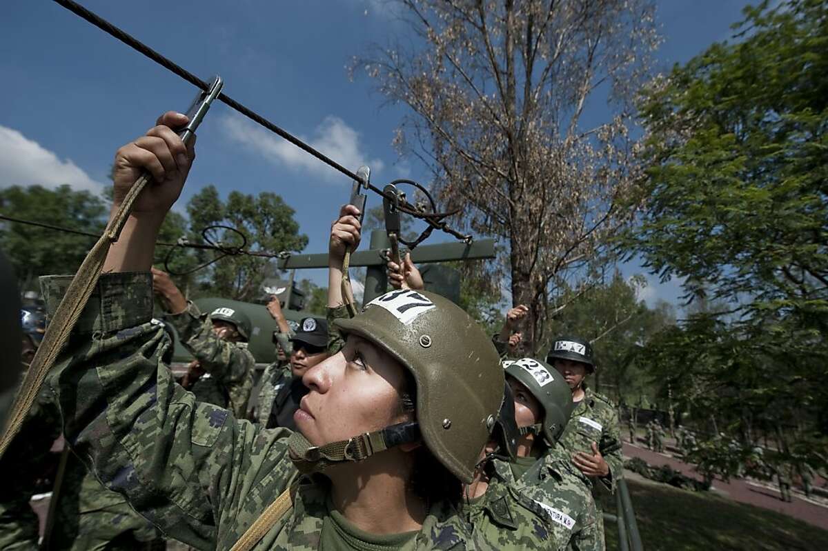 New generation of female soldiers in Mexico completes first jump