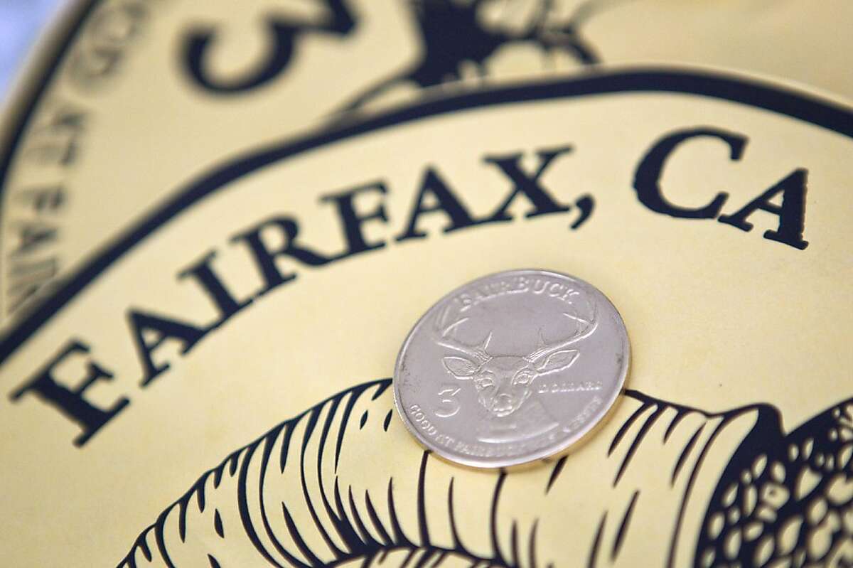 Communities issue currency, promote local spending