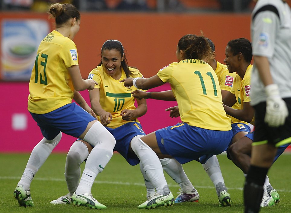 Marta scores twice, Brazil moves to quarters