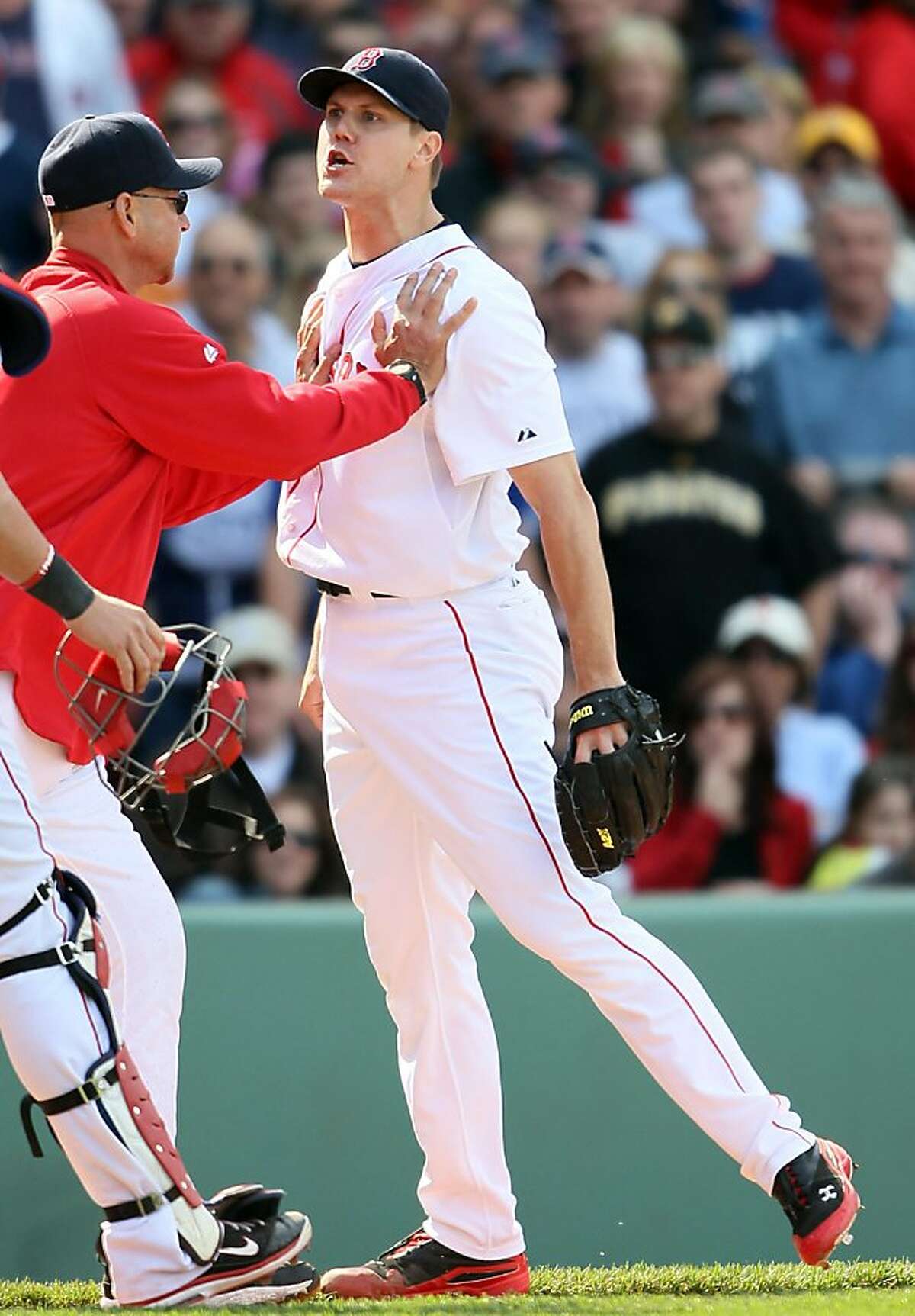 A's rally with 4 in 9th, lose to Red Sox in 14th