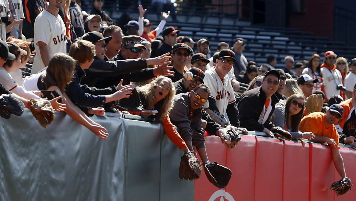 S.F. Giants fans celebrate an eventful home opener
