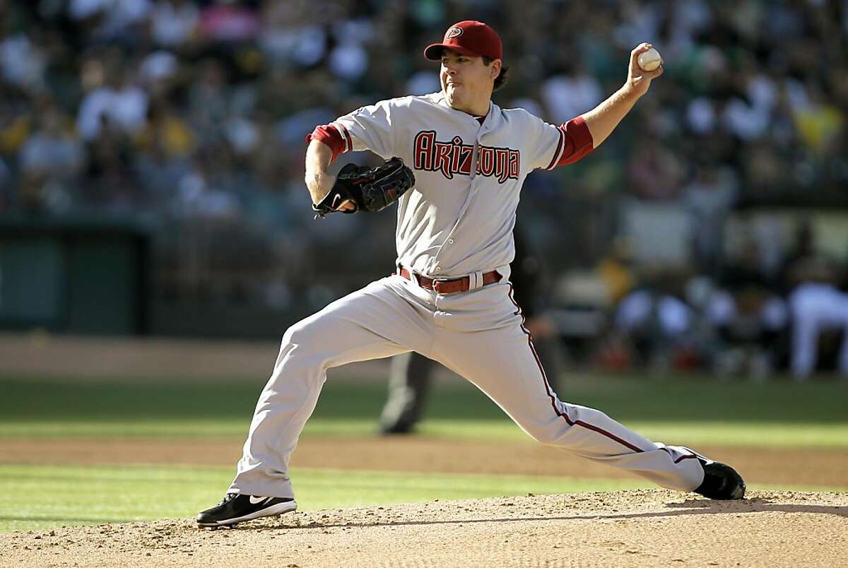 A's shut down by D'backs' Joe Saunders, lose 4-2