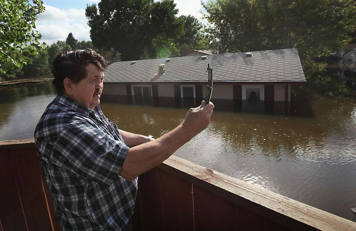 Souris River surges past 130-year-old flood record