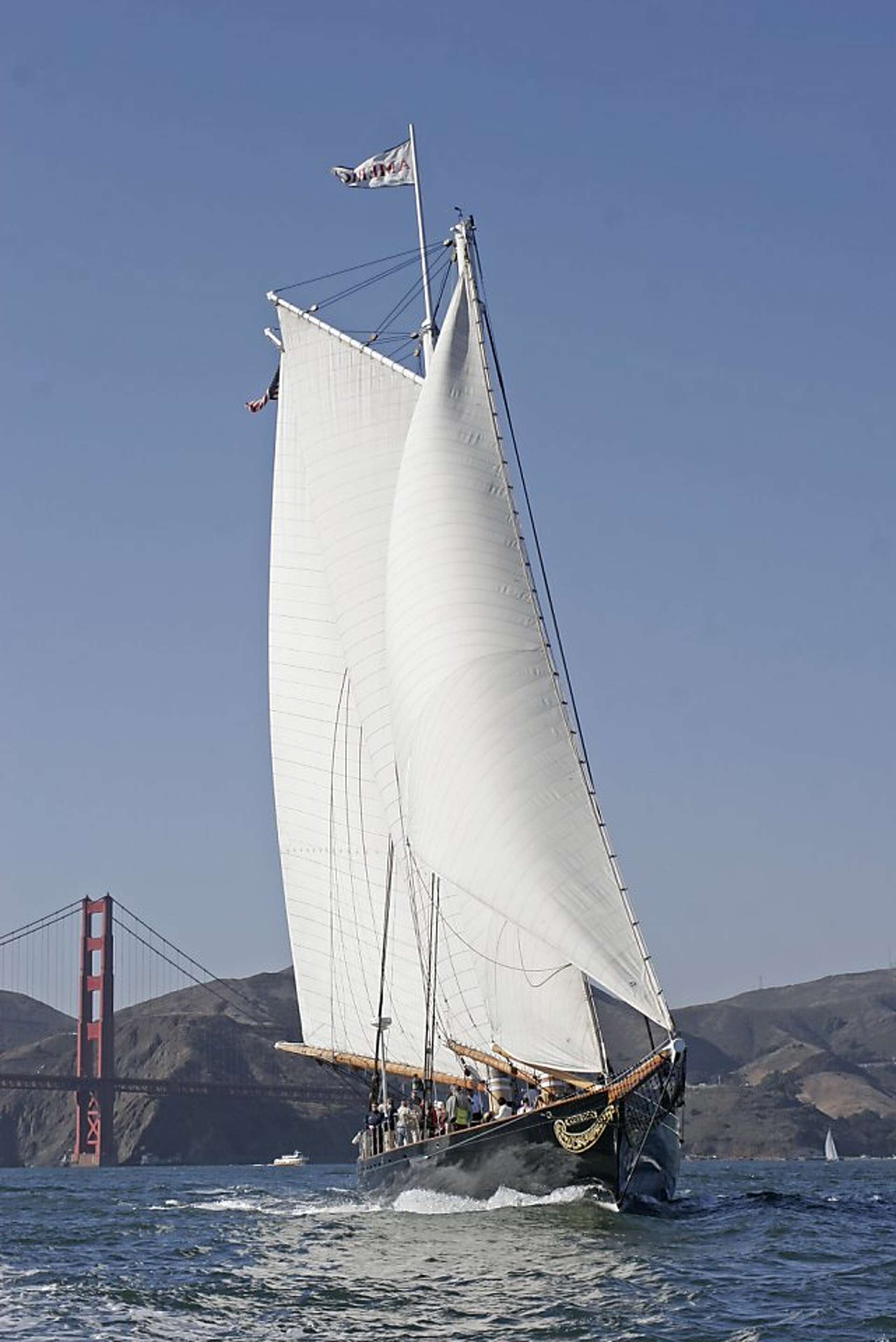 Historic America's Cup-design boats dock in bay