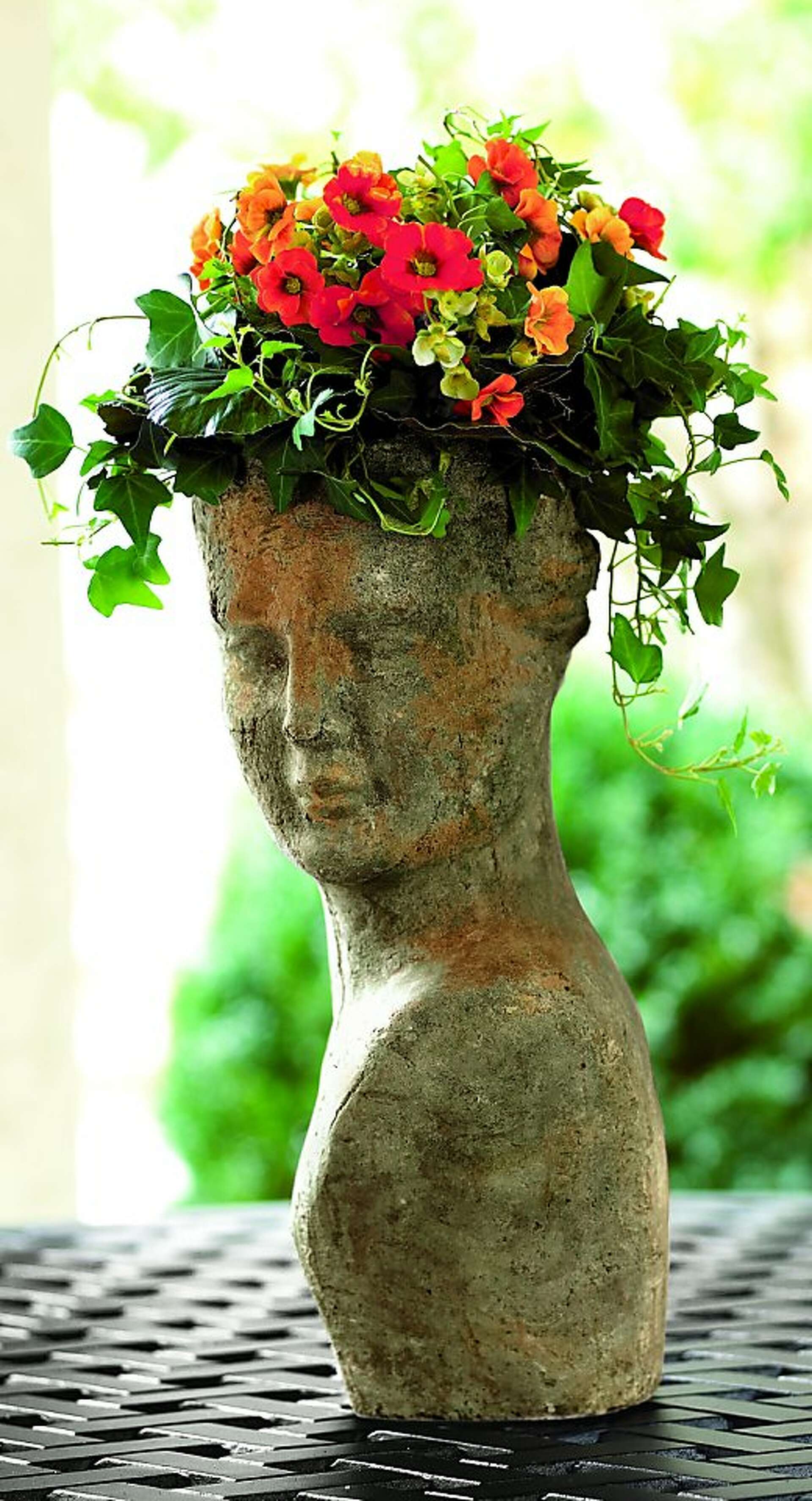 Female bust planters with succulents