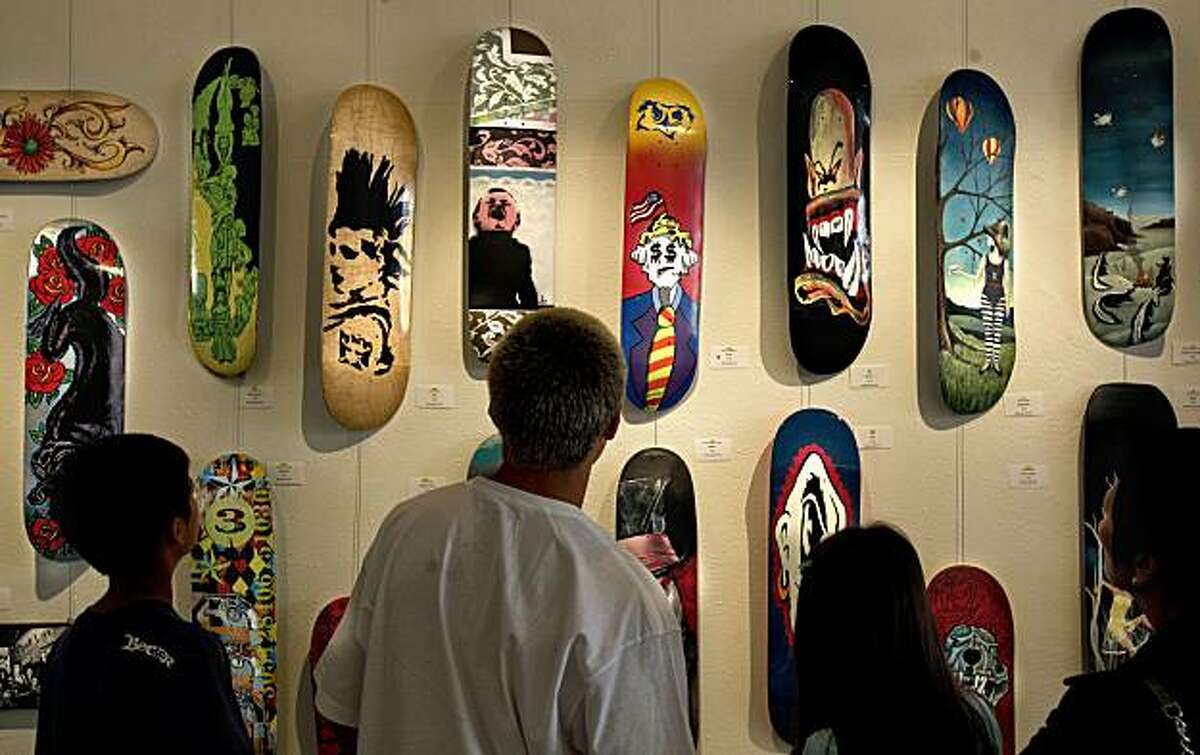 Exhibition turns skateboards into populist art