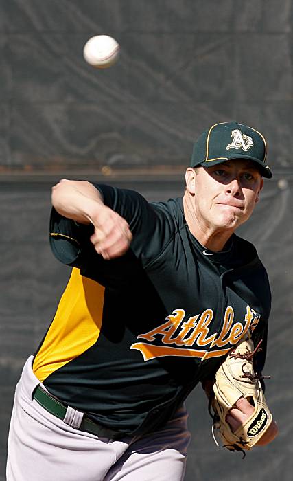 A's Andrew Bailey exits with elbow injury