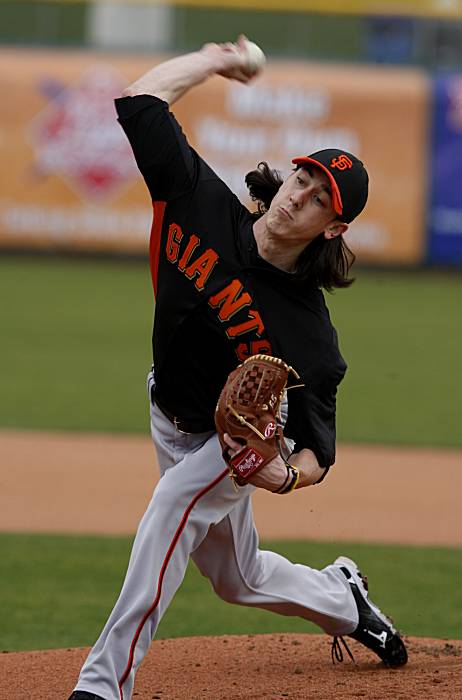 SF Giants 'go for it' at first workout as champs