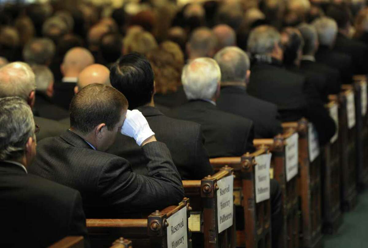 Song helps honor judge at funeral