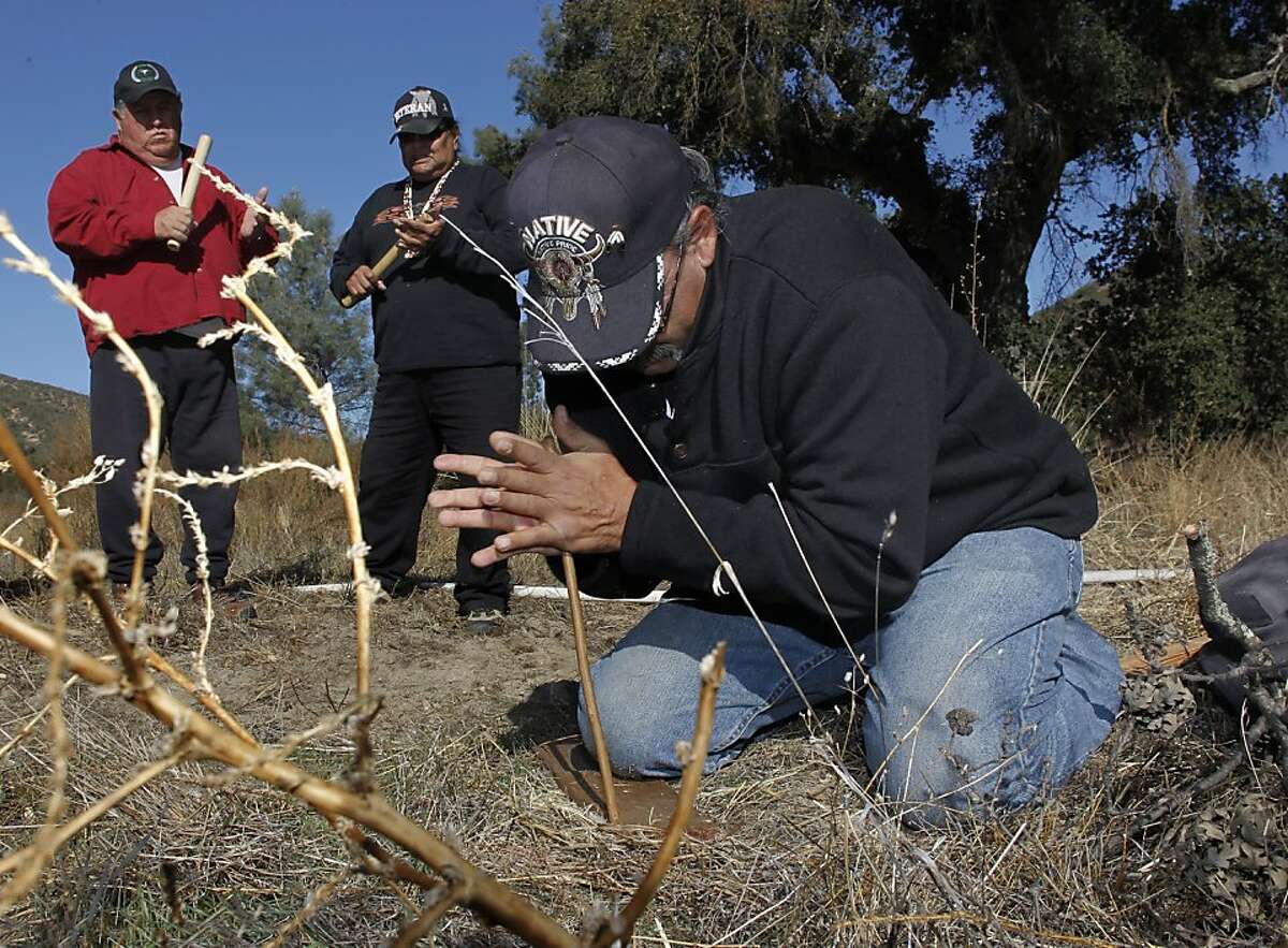 Grass is burned to study Indian culture