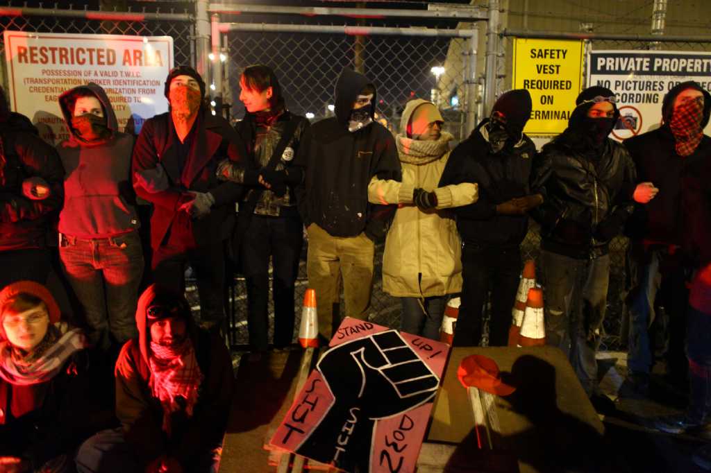 Port protests hit some workers' paychecks