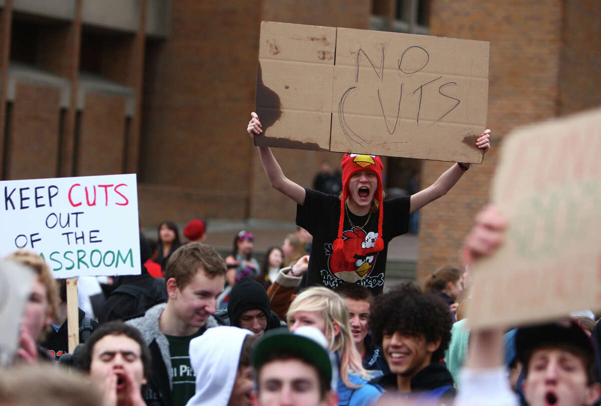 Local high school students walk out, protest education cuts