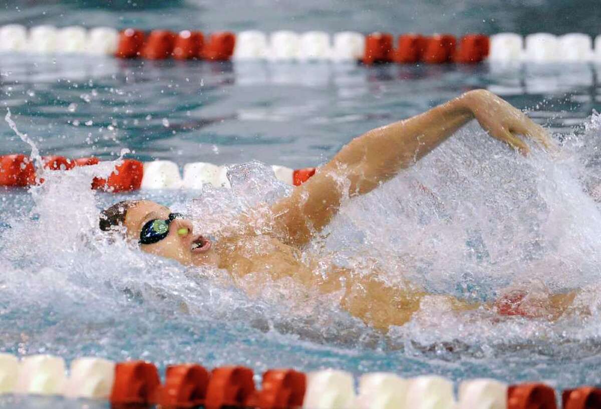 Greenwich swims past New Canaan in its season-opener