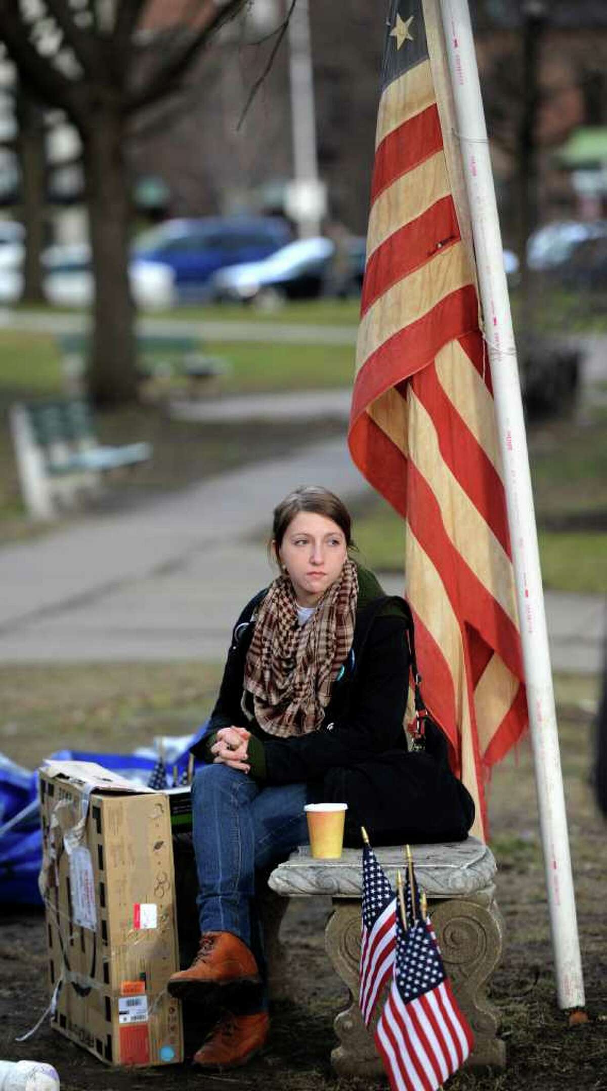 Protesters, police tussle as tents fall