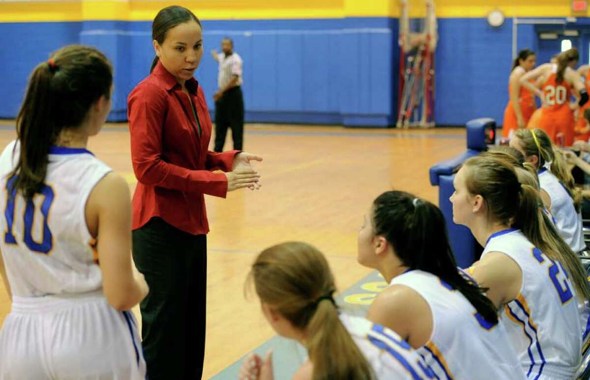 Father/daughter duo coaching basketball at Kelly