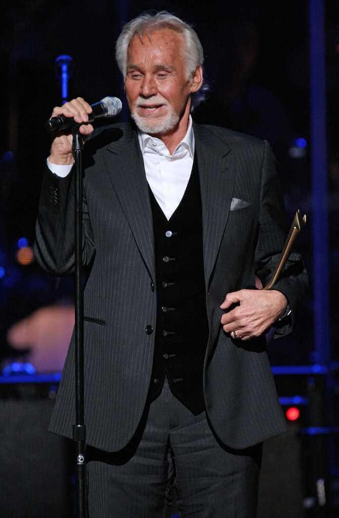 Rogers celebrate hits — his own and Christmas'