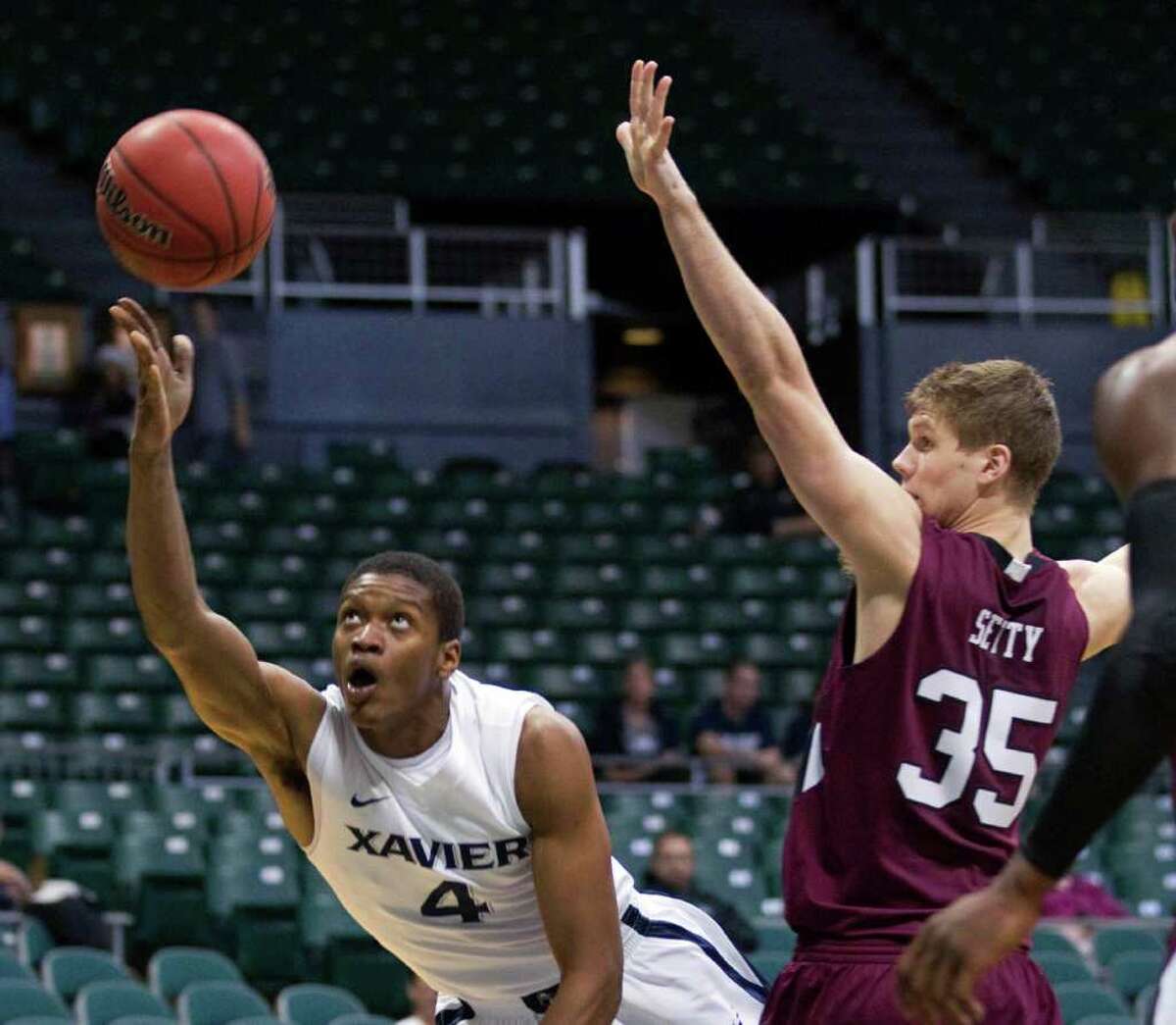 Lyons' double-double sparks Xavier victory