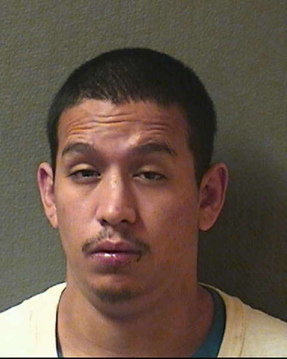 Man accused of firing at neighbor's pickup