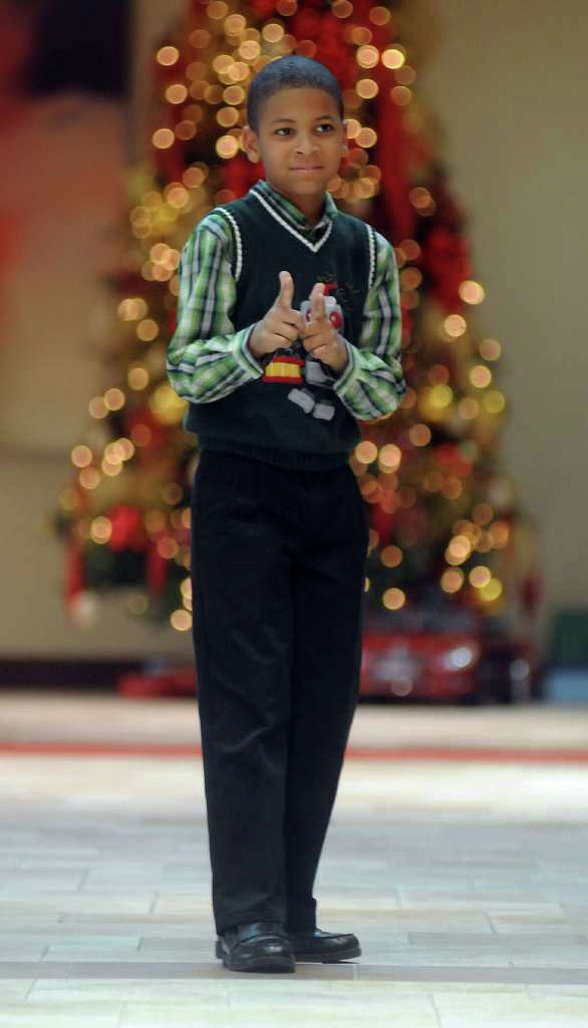 Kids model holiday fashions