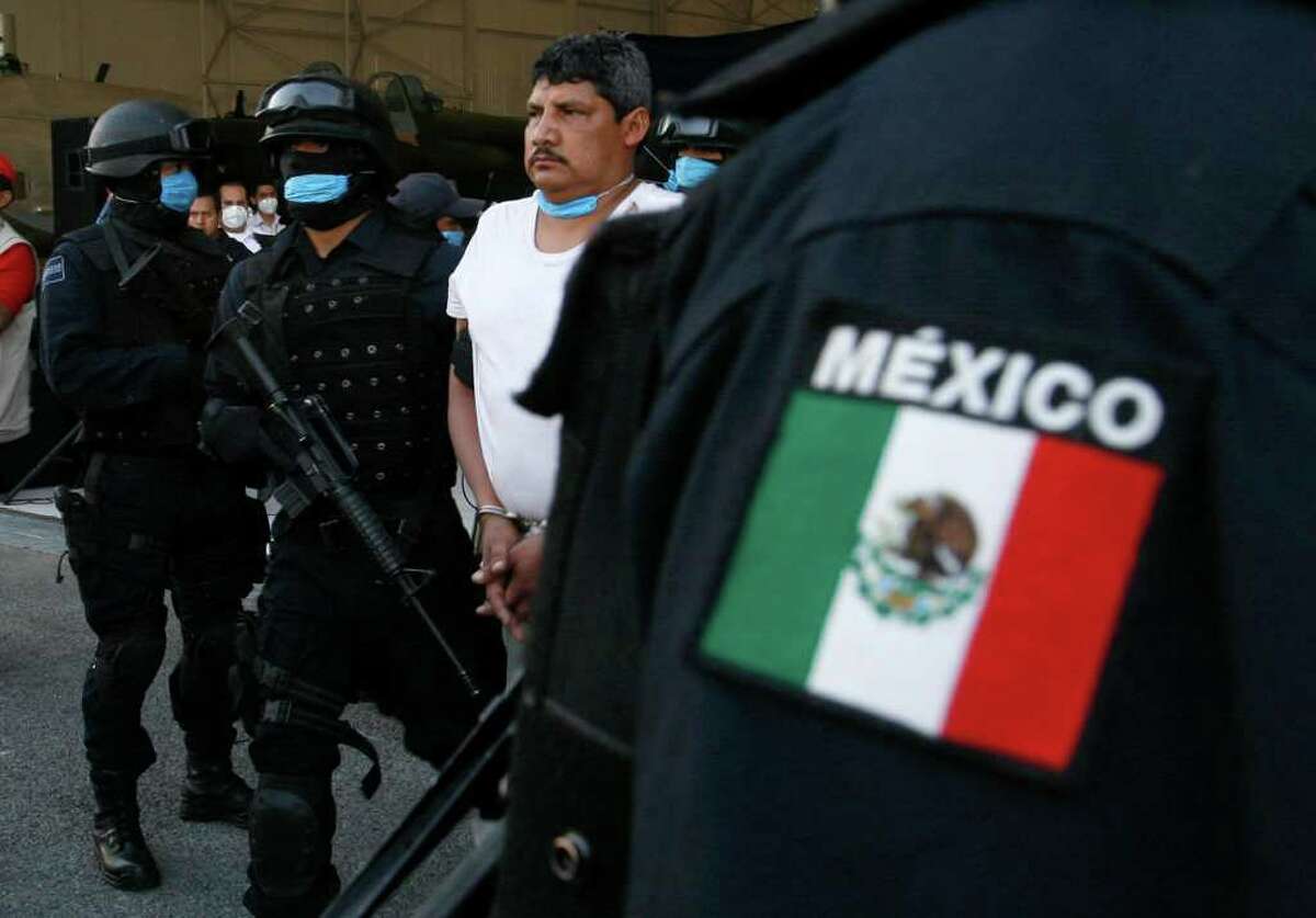 Mexico gangster crackdown nails dozens, but still falls short