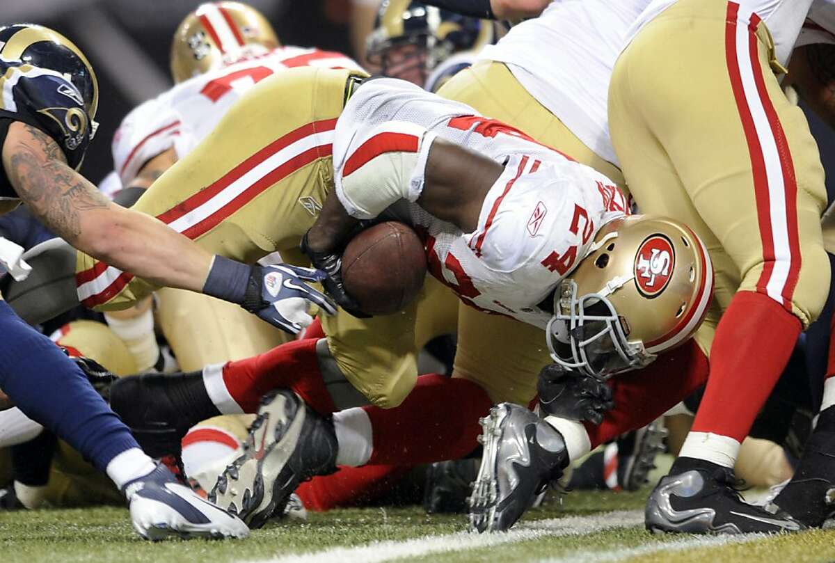 49ers earn playoff bye with 34-27 win over Rams