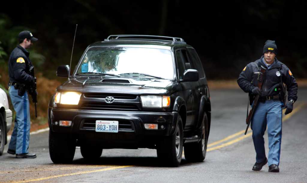 Gunman loose in national park after ranger shot to death