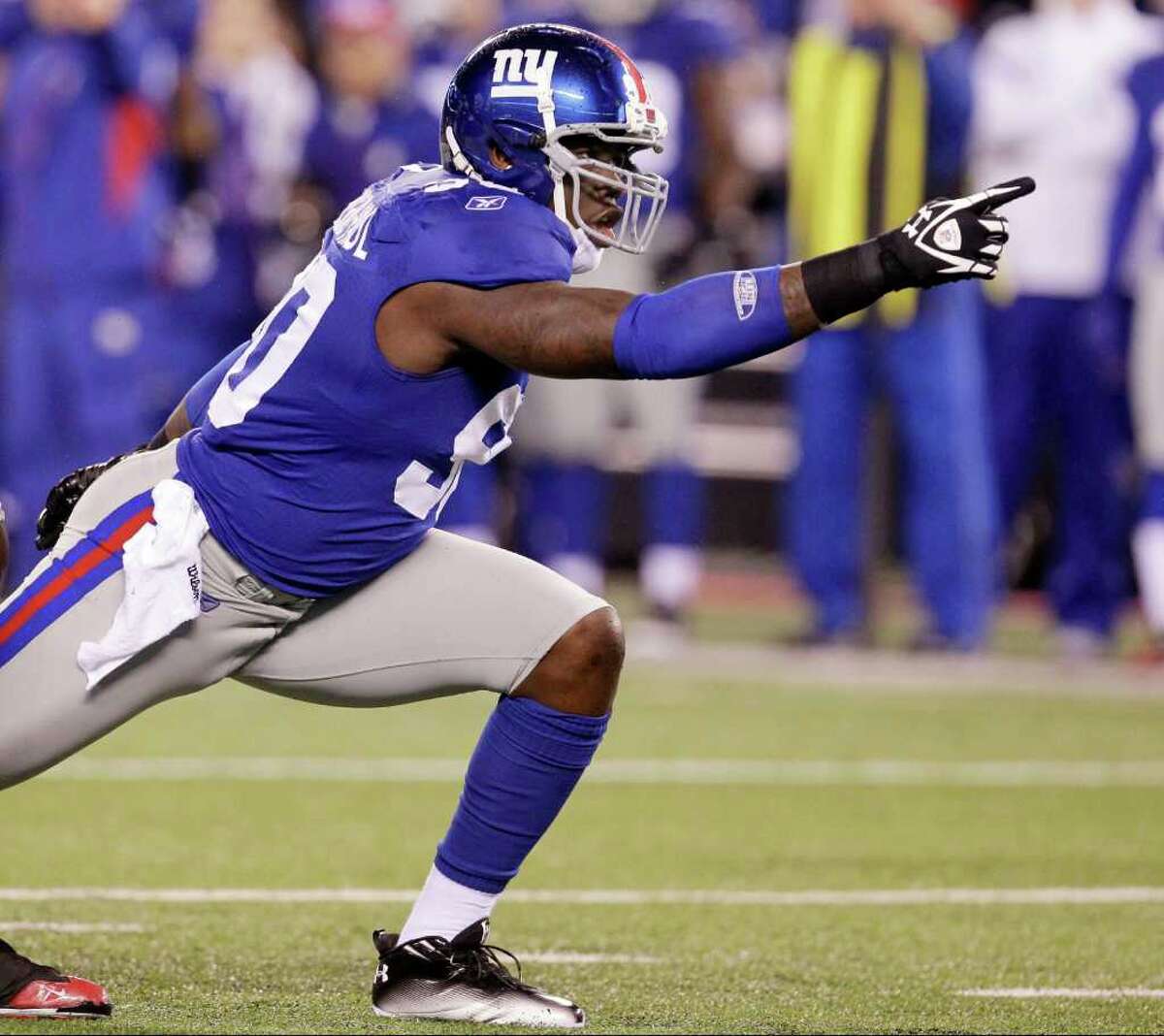 Giants win NFC East, beat Cowboys 31-14 (with photos)