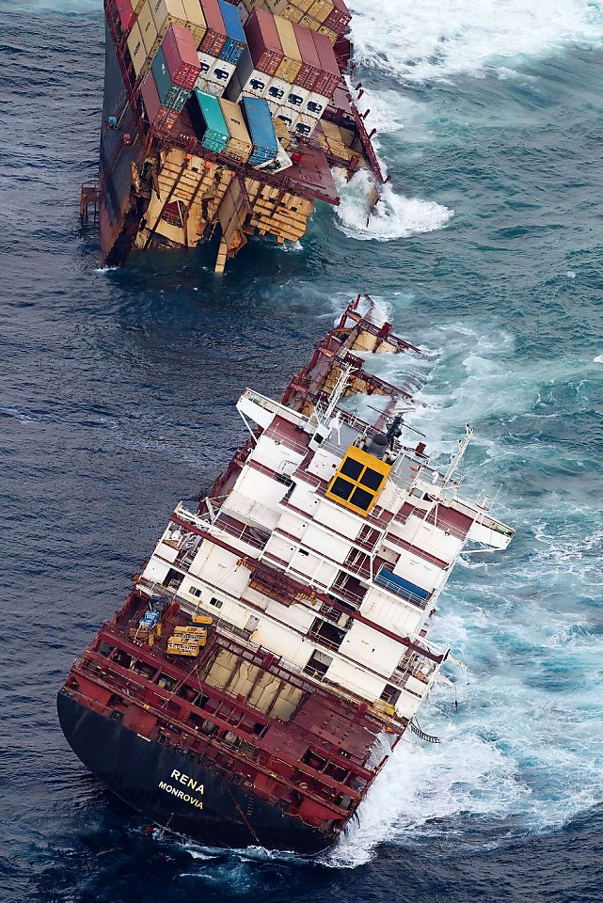 Wrecked cargo ship on New Zealand reef breaks up
