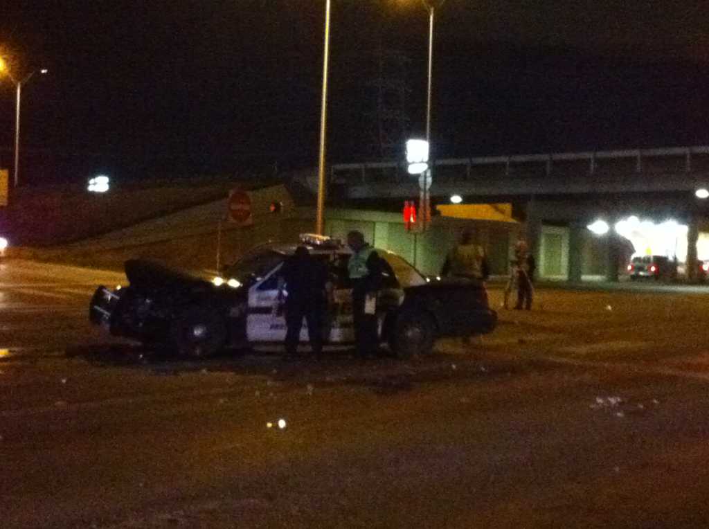 Officer collides with car during pursuit of stolen big rig
