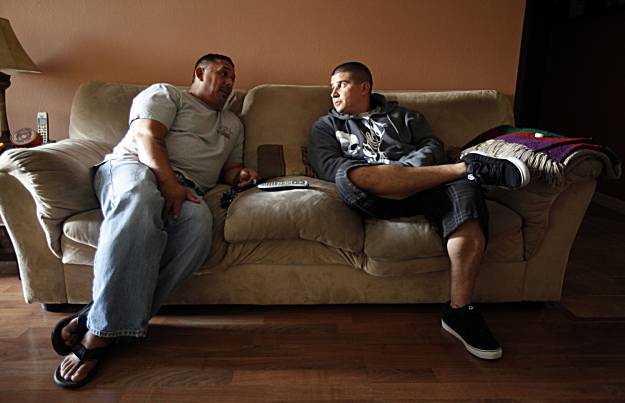 Father, son help each other after brain injuries