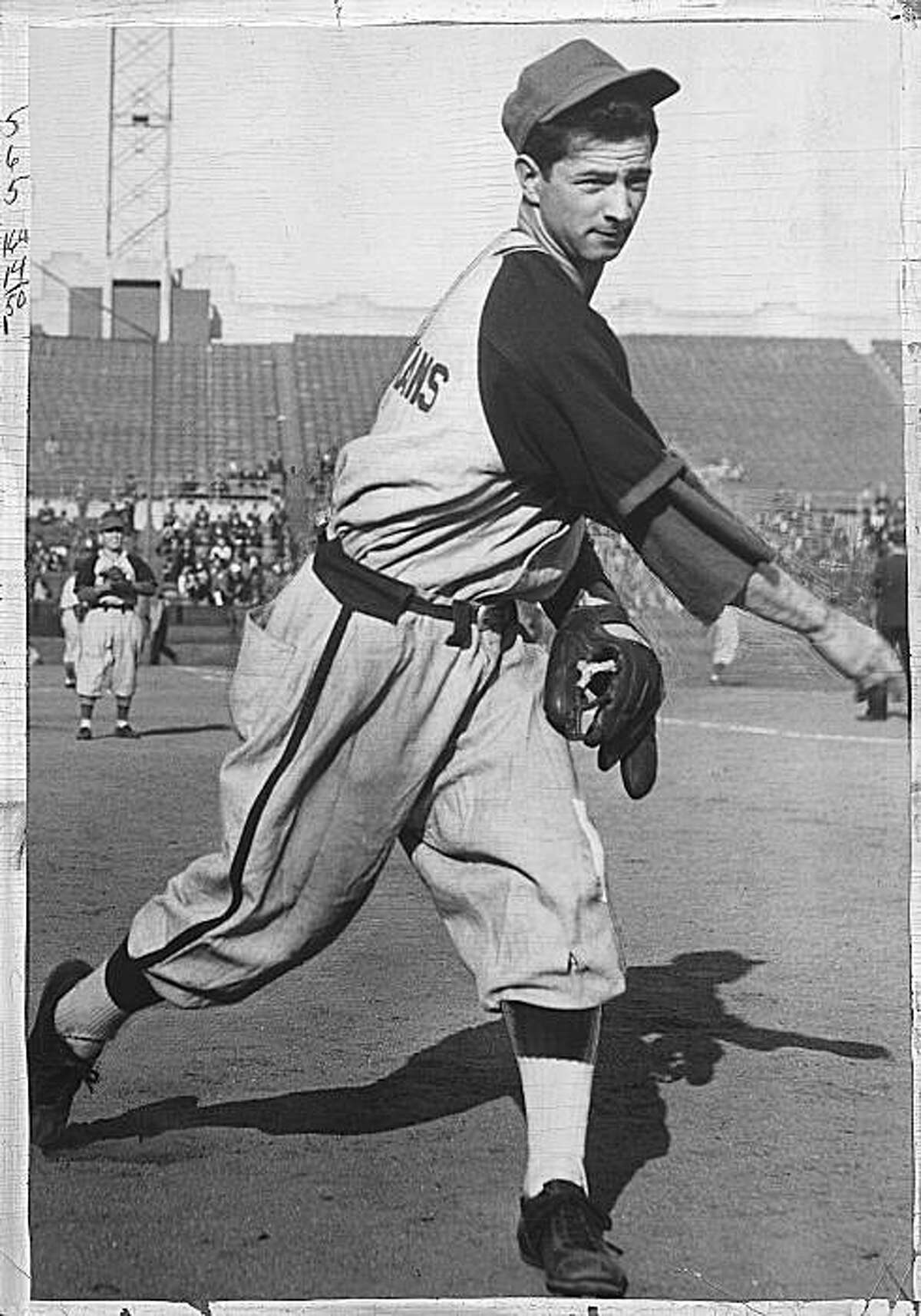 Old ballplayers lift a glass to Marino Pieretti