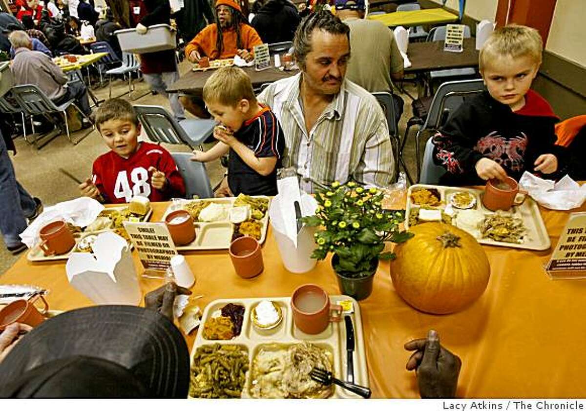 Lines for free Thanksgiving meals growing