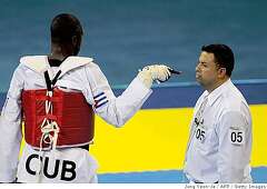 Notebook: Disqualified Cuban attacks tae kwon do ref