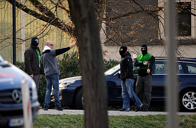 German police says suspect admits killing airmen