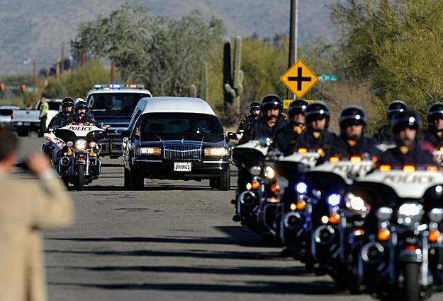 Judge John Roll, Tucson shooting victim, mourned