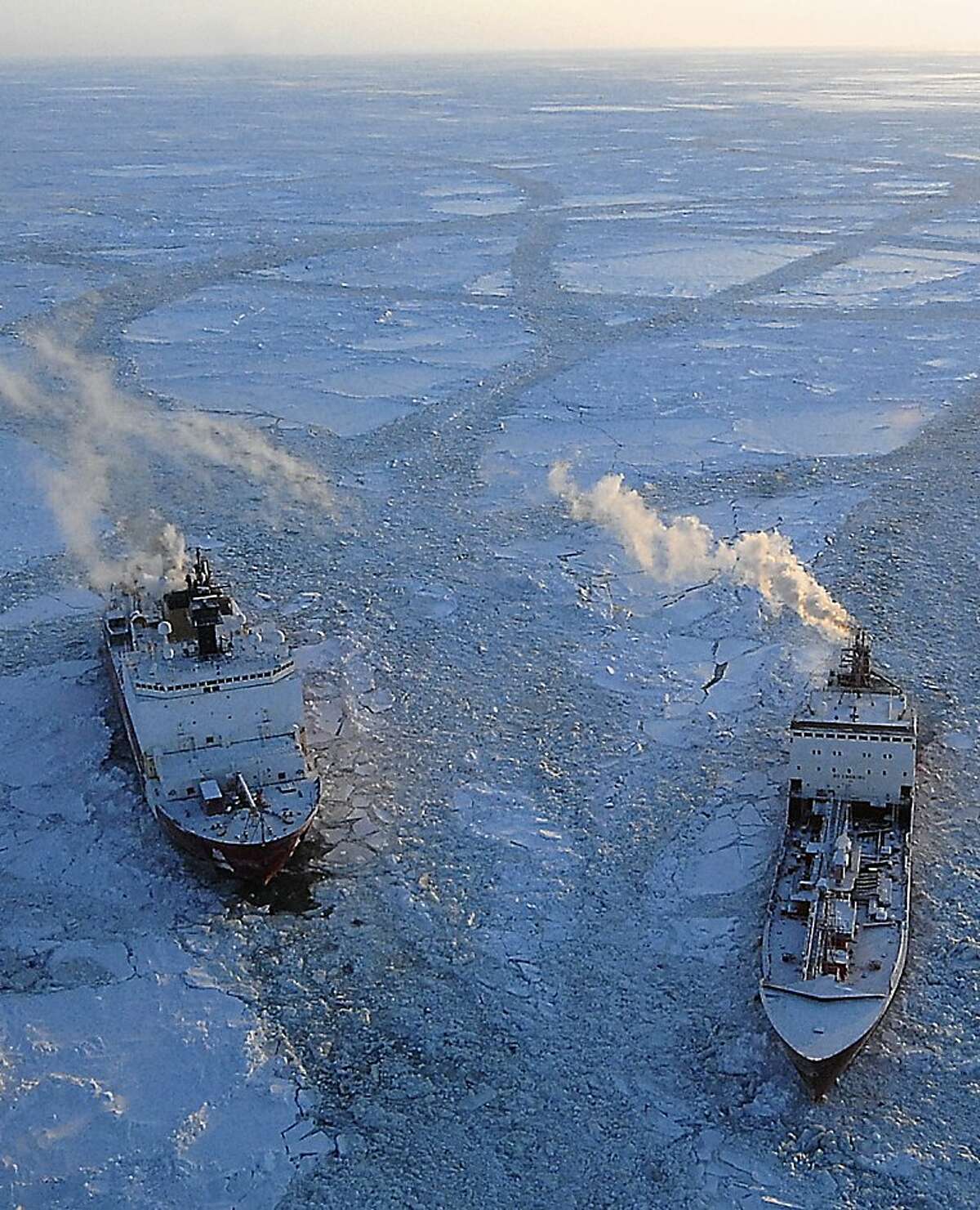 Buried in snow, Alaska town orders bigger shovels