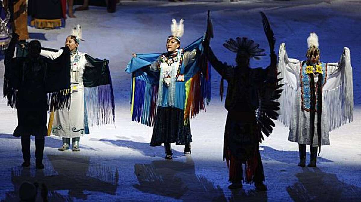 Olympics begin with mix of beauty, tragedy