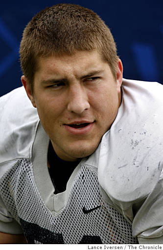 Mack staying in school