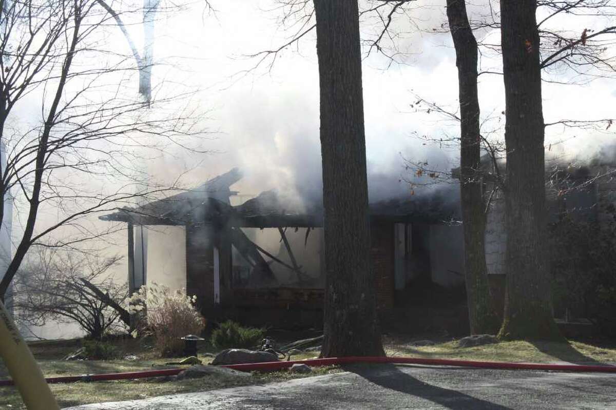 Fire razes New Canaan home