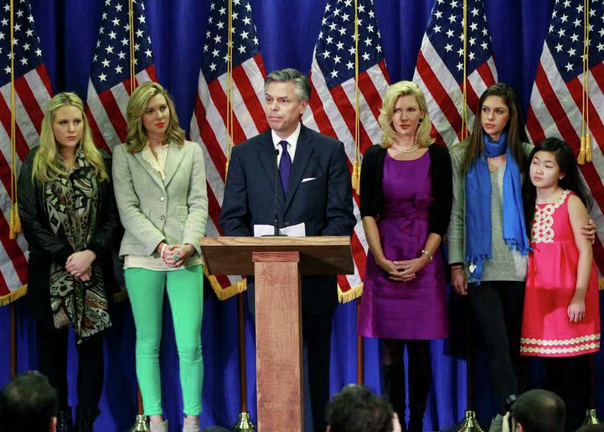 Huntsman departs race, backs Romney